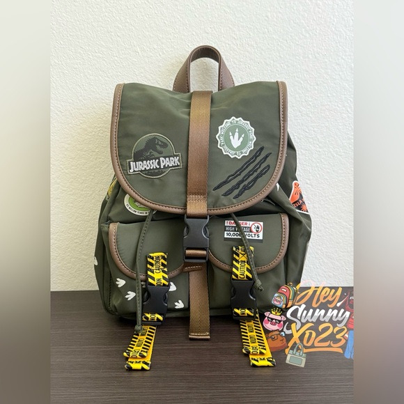Universal Studio | Bags | Jurassic Park Dinosaur Patches Slouch Mini ...